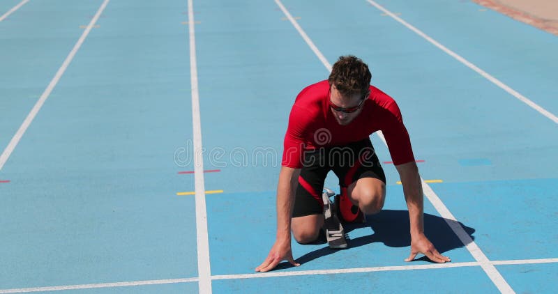 Runner Athlete Starting Running at Starting Blocks - Sprinter Man ...