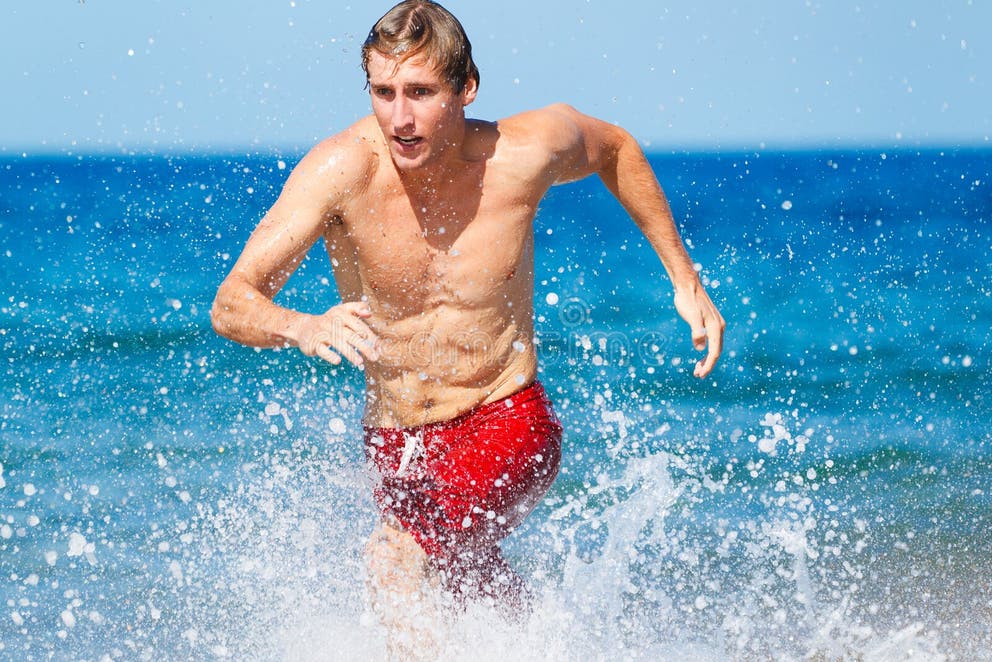 Runner on Beach stock photo. Image of full, maui, handsome - 24448340
