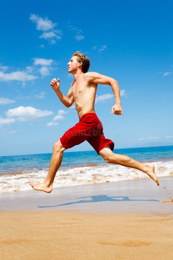 Runner on Beach stock photo. Image of colour, coast, physical - 24448418