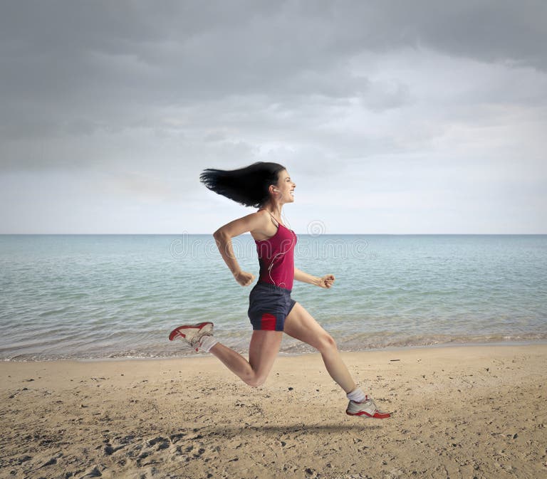 Runner at the beach stock photo. Image of young, summer - 63590068