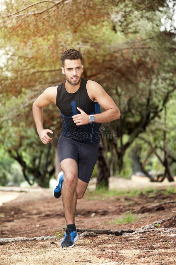 Runner boy in the forest stock image. Image of running - 60427349