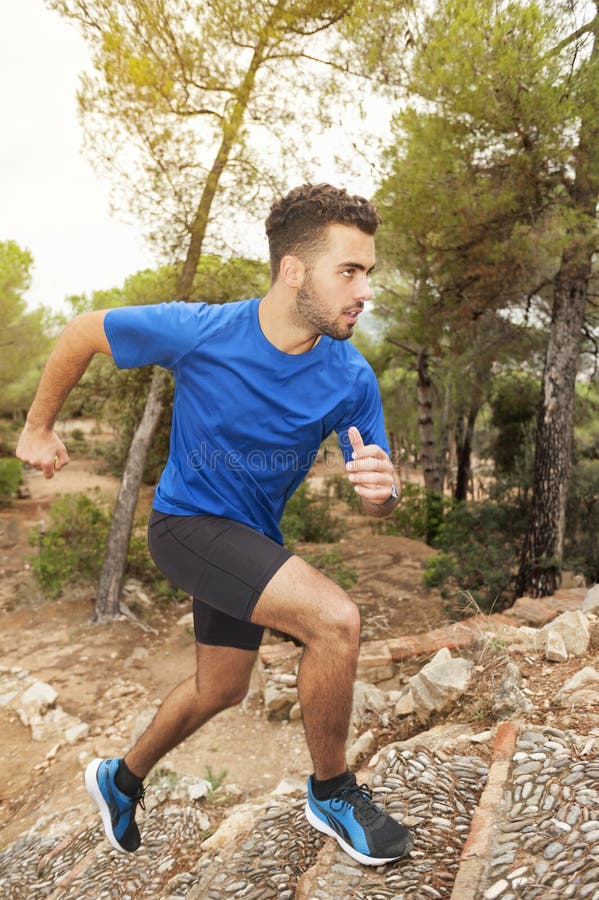 Runner boy in the forest stock photo. Image of mediterranean - 60432298