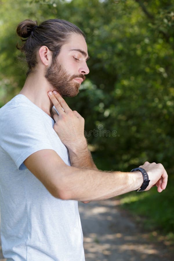Runner Checking Heart Rate Pulse Stock Image - Image of measuring ...