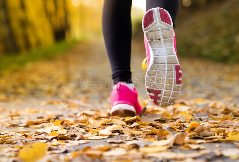Close Up of Fitness Woman Athlete`s Running Shoes while Walking in the ...