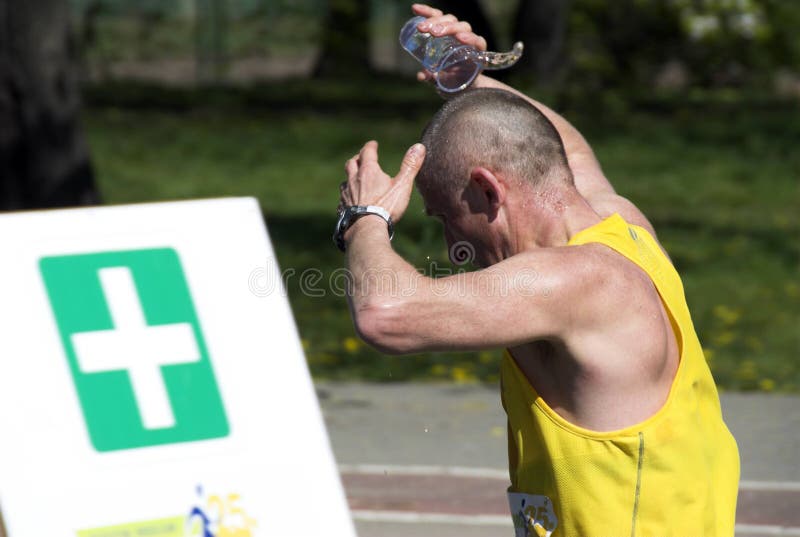Runner cooling down editorial image. Image of green, athlete - 4238465
