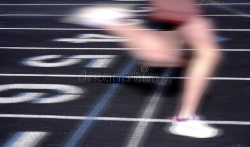 Runner Crossing the Finish Line of a Race on a Track Blurred Stock ...