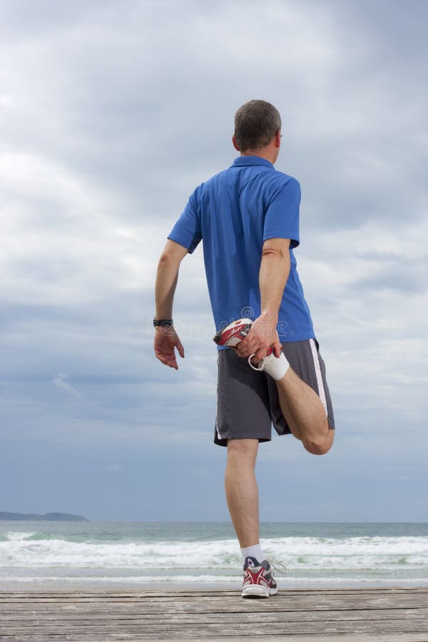 Runner Doing Stretching Exercise Stock Image - Image of athletic ...