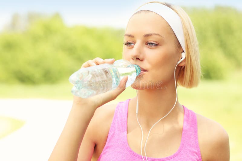 Runner Drinking Water in the Park Stock Image - Image of portrait ...