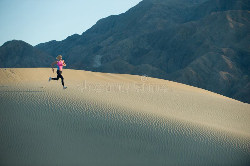 Runner on dunes stock photo. Image of isolated, athlete - 13502722