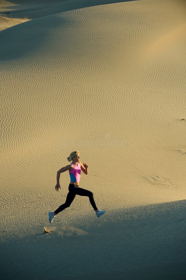 Runner on Sand Dunes stock photo. Image of blonde, body - 13881708