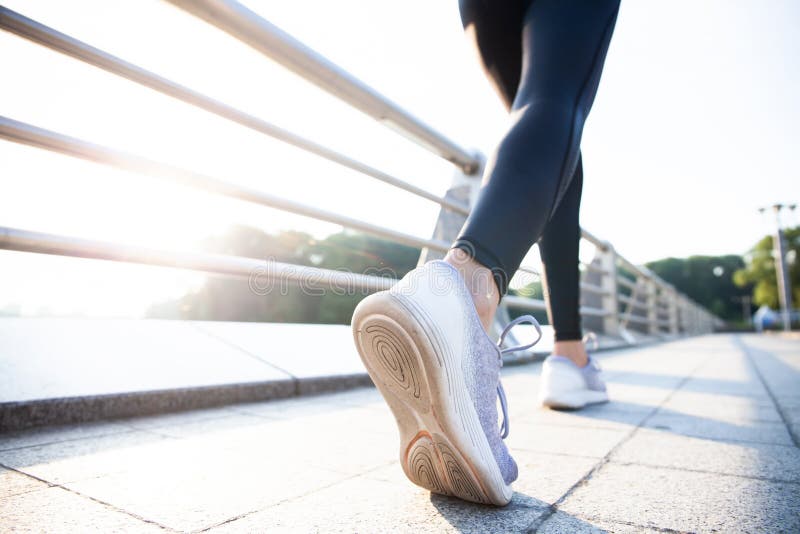 Runner Feet Running on Road Closeup on Shoe. Stock Image - Image of ...