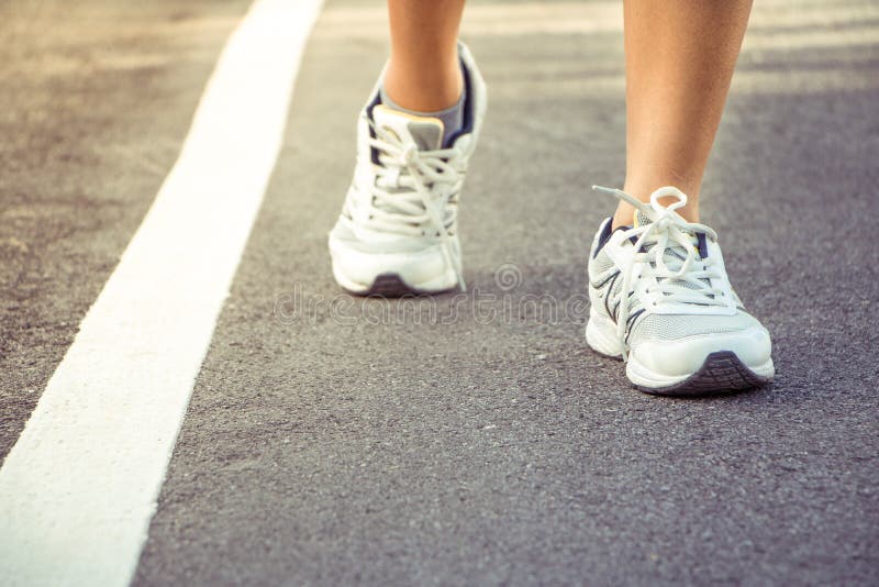 Runner Feet Running on Road Closeup on Shoe. Stock Image - Image of ...