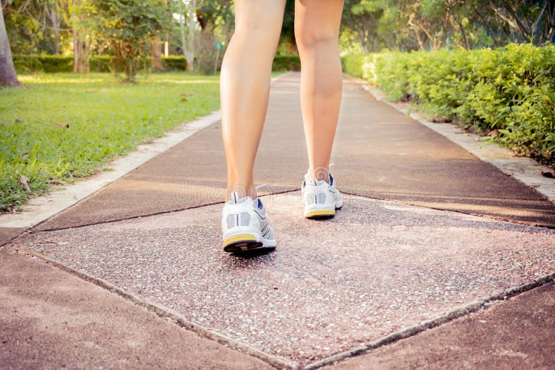 Runner Feet Running on Road Closeup on Shoe. Stock Image - Image of ...