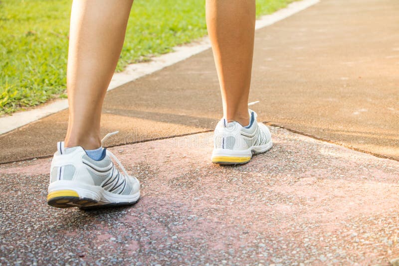 Runner Feet Running on Road Closeup on Shoe. Stock Image - Image of ...
