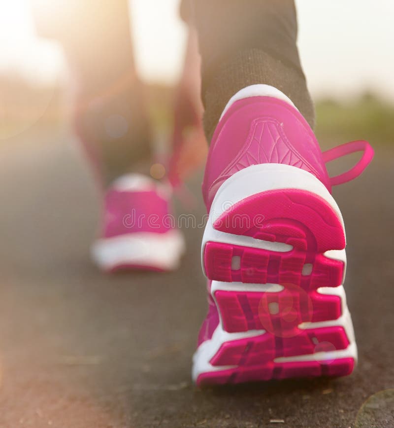 Runner Woman Feet Running on Road Closeup on Shoe. Female Fitness Model ...