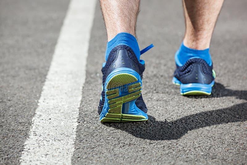 Runner Feet Running on Stadium Stock Photo - Image of jogging, marathon ...
