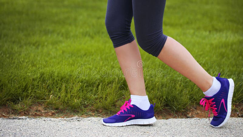Runner Female Feet Running Beside Green Grass Stock Photo - Image of ...