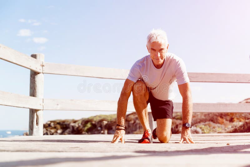 Runner Getting Ready To Start the Race Stock Photo - Image of muscular ...