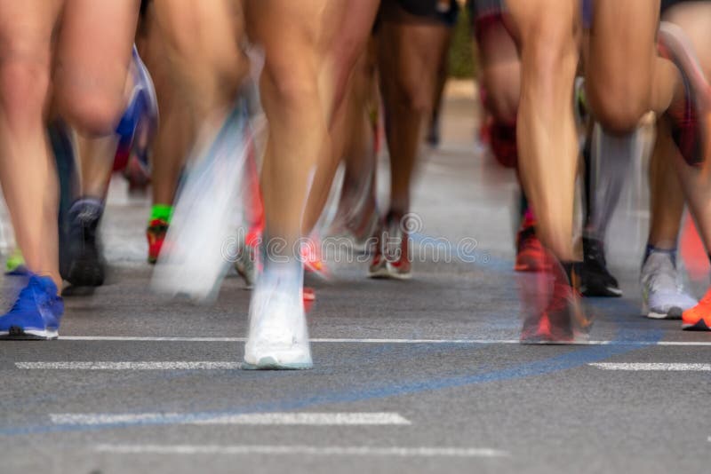 Runner Legs Front View in Blurred Motion Stock Photo - Image of ...