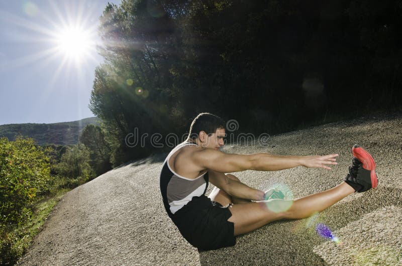 Runner Stretching after Training on Red Bridge Stock Image - Image of ...
