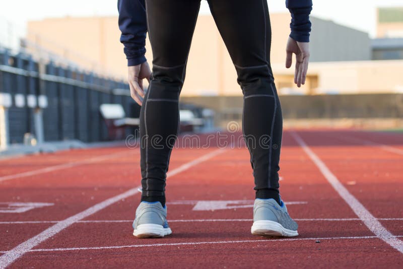 Runner Looking Down the Track Stock Image - Image of hard, weight: 85730317