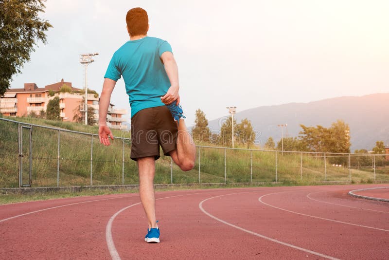 Runner Making Stretching on the Track Stock Image - Image of hands ...
