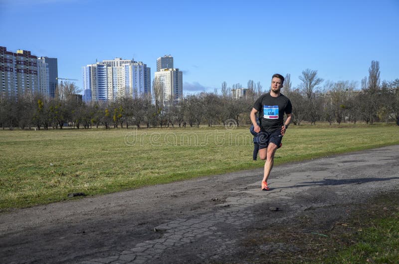 Runner Man Running on Road during Marathon Doing High Intensity ...