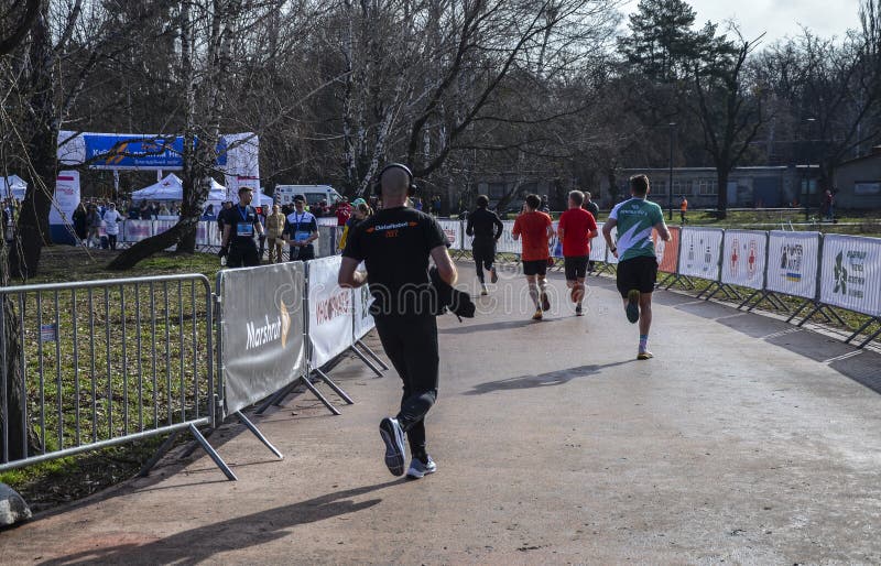 Runner Man Running on Road during Marathon Doing High Intensity ...