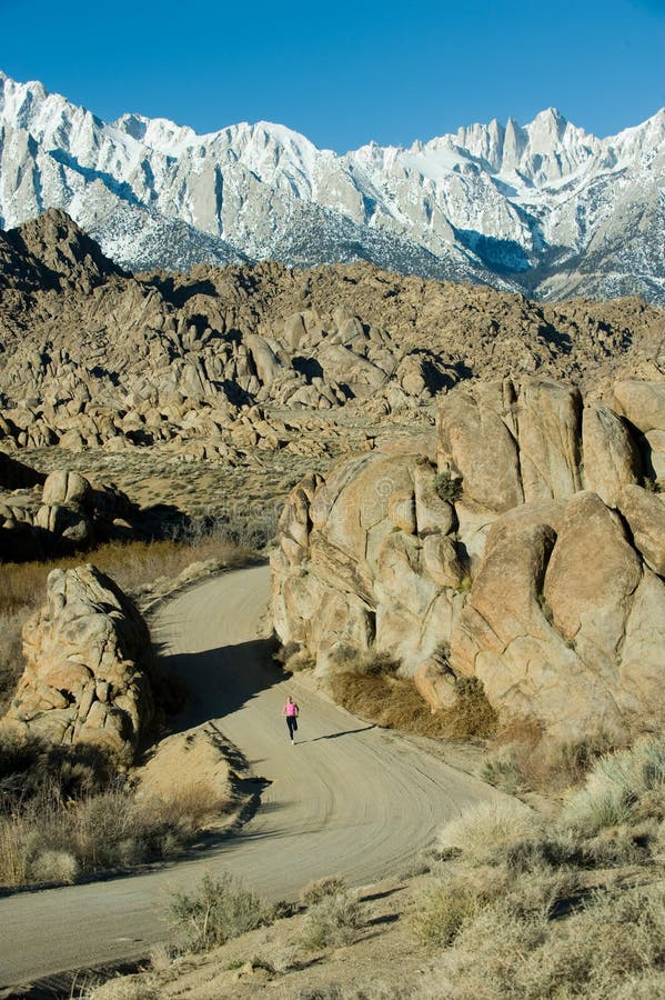 Runner on Mountain Road stock photo. Image of isolated - 13663154