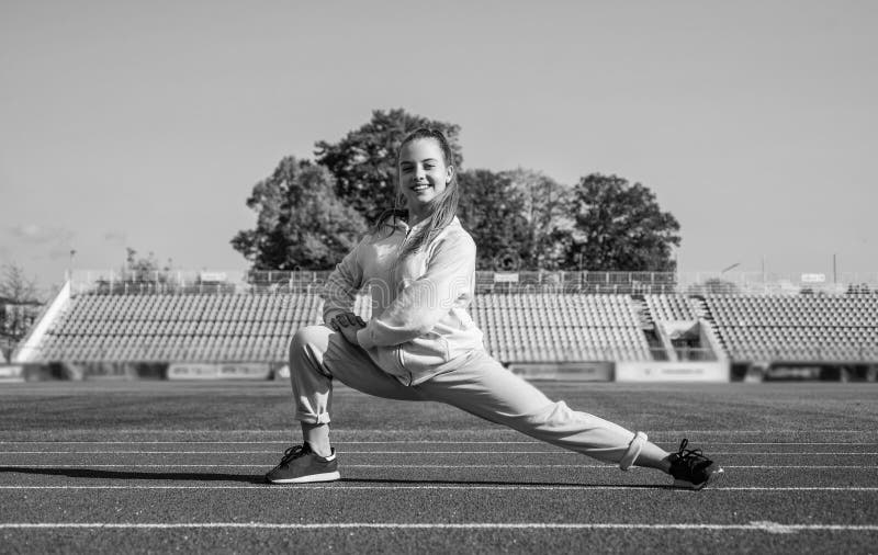 Runner Prepare for Race Competition. Sprinter Warming Up on Stadium Gym ...
