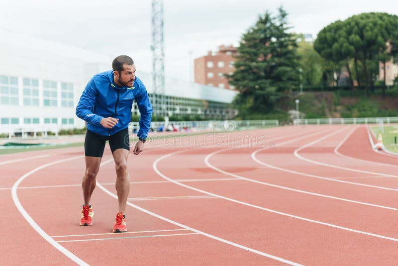 Runner Ready To Run is Ready To Run. Stock Photo - Image of checking ...