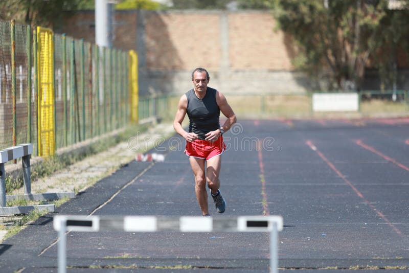 Runner Running Towards the Obstacle Stock Photo - Image of ...