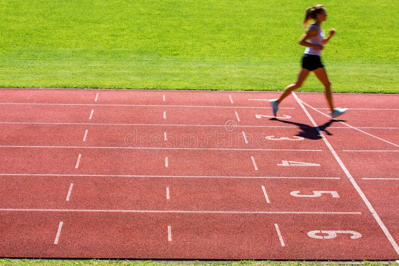 Runner on a Running Track Finishing a Race First Stock Photo - Image of ...