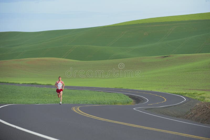 Runner on Rural Road stock image. Image of cardio, female - 9833163