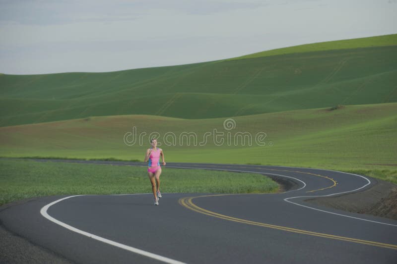 Runner on Rural Road stock photo. Image of lifestyle, country - 9833168