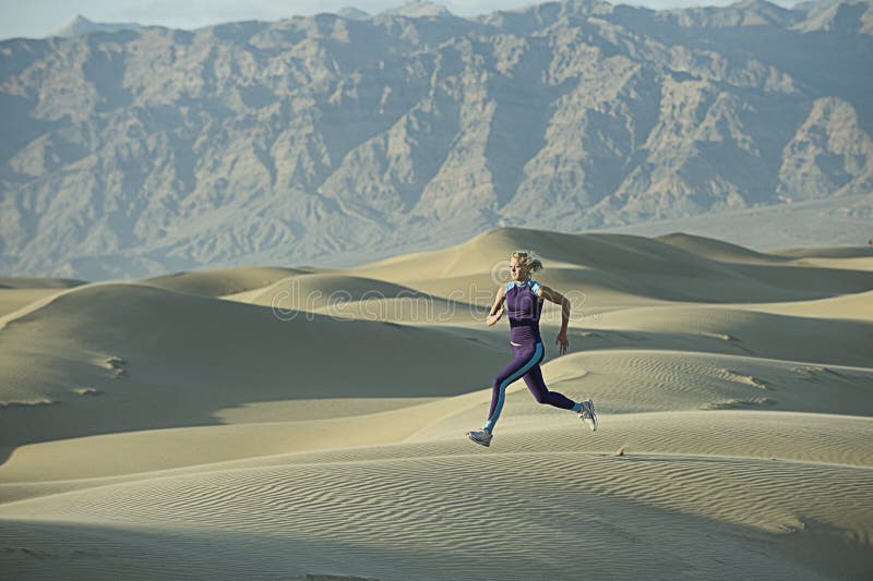 Runner on Sand Dunes stock photo. Image of blonde, body - 13881708