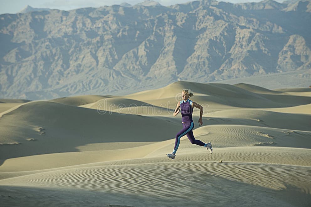 Runner on Sand Dunes stock image. Image of athletic, body - 14592071