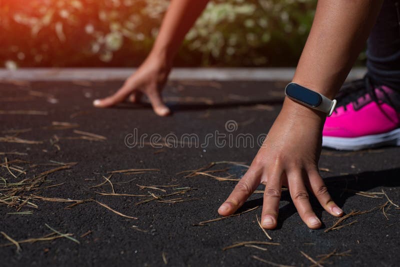 Runner Start Position. Closeup of Runner`s Hands on Start Position ...