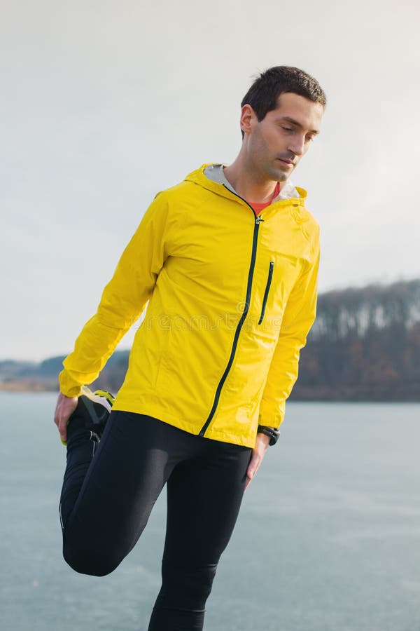 Runner stretching outdoor stock photo. Image of spikes - 83177918