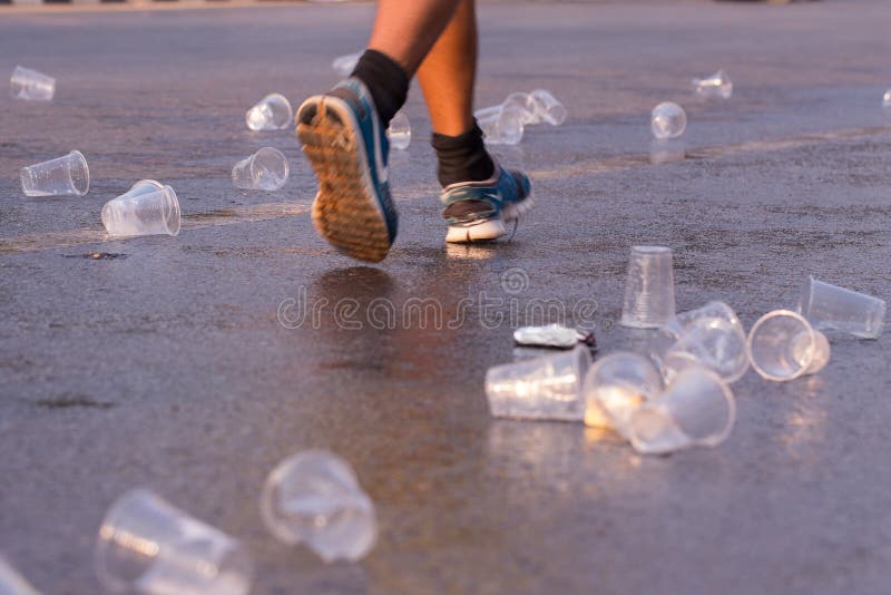 Runner Take a Water in a Marathon Race Editorial Stock Photo - Image of ...