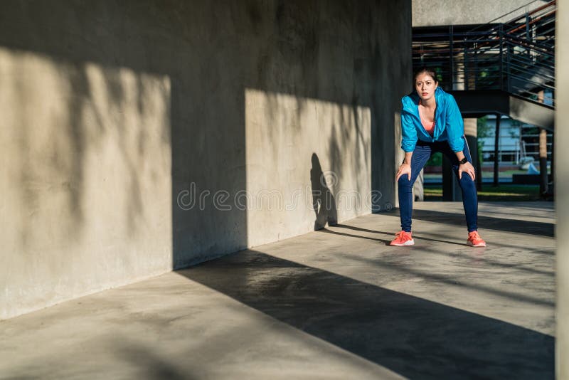 Runner Taking a Break after a Running Workout. Stock Image - Image of ...