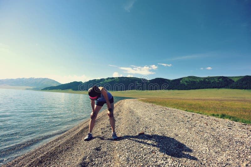 Runner Taking a Rest after Running Seaside Stock Photo - Image of ...