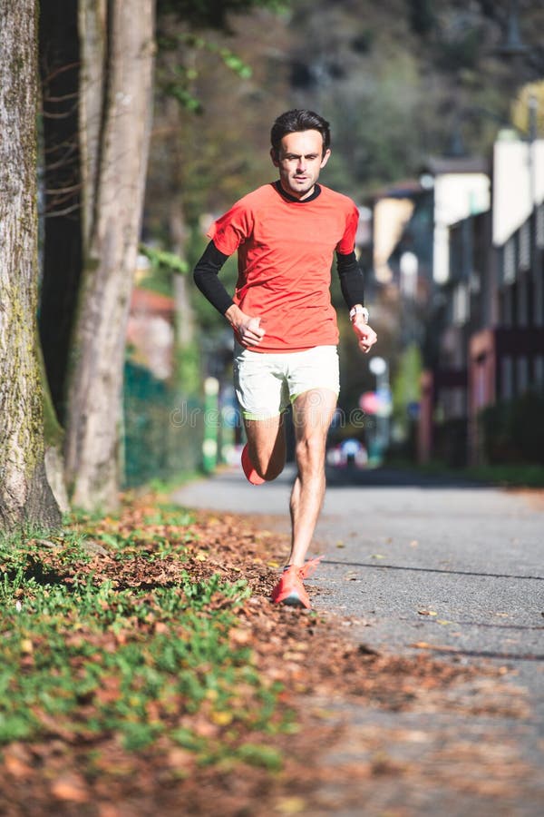 Runner trains for marathon stock photo. Image of pace - 345232928