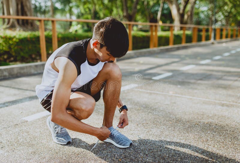 Runner Trying Running Shoes Getting Ready for Run. Healthy Lifestyle ...