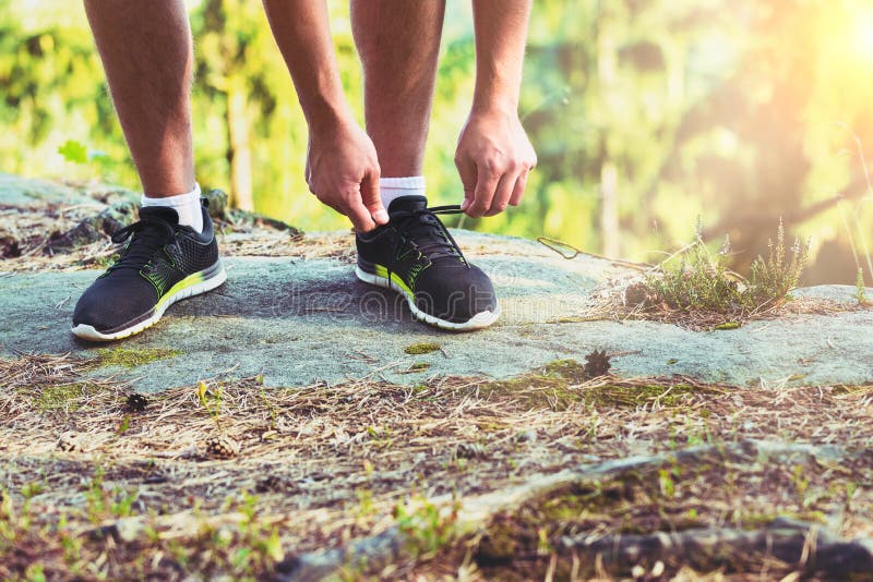 Runner Tying His Shoe Laces Stock Image - Image of legs, athletic: 70394203