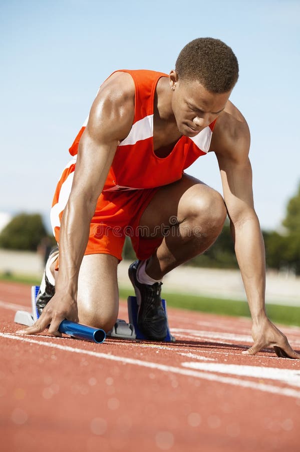 Runner Waiting at Starting Block Stock Image - Image of block, runner ...