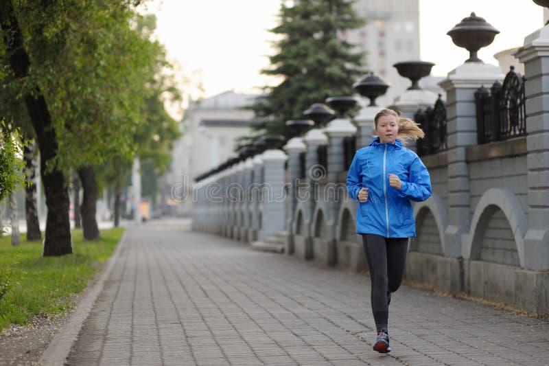 Runner Woman Running on Road in the Park. Stock Image - Image of ...