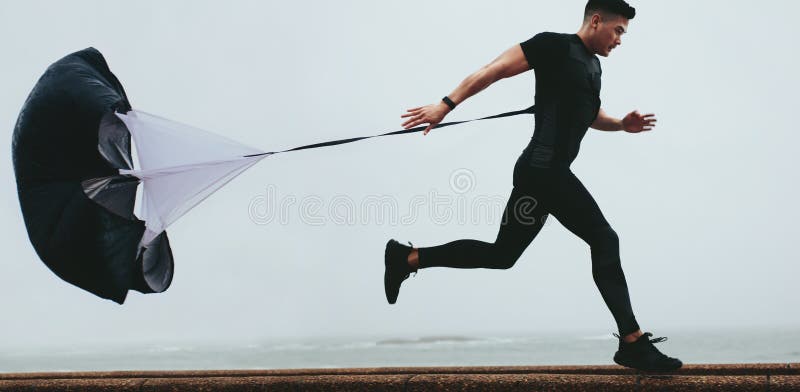 Side View Man Running Parachute Stock Photos - Free & Royalty-Free ...