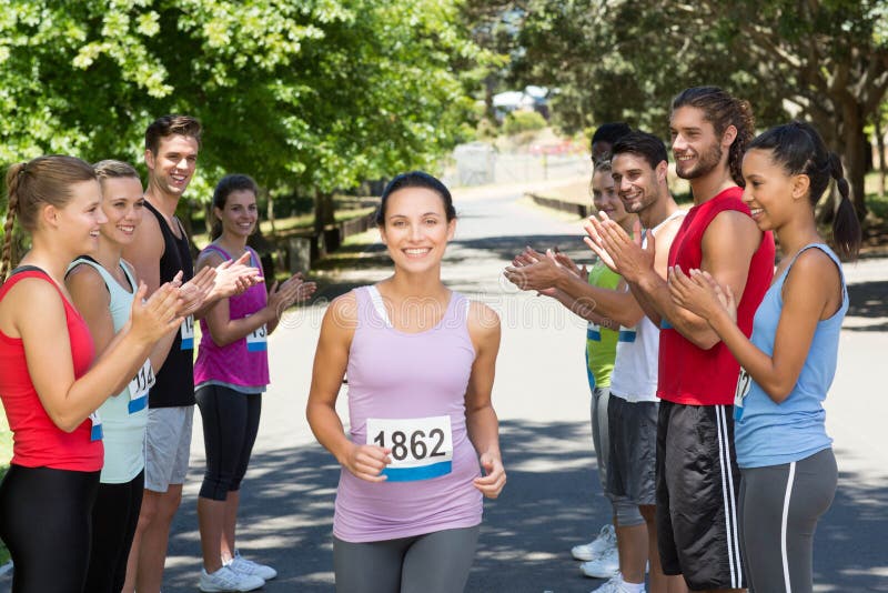 Runners Applauding a Racer in the Park Stock Photo - Image of healthy ...