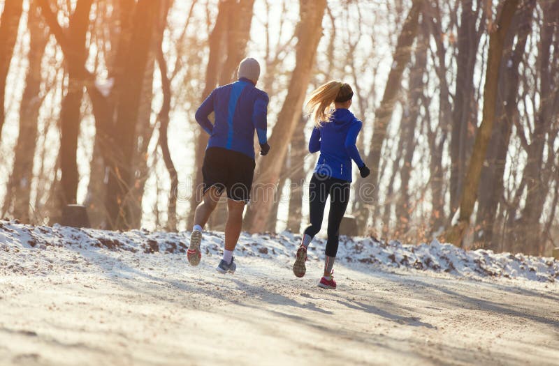 Runners Couple Running through Forest Stock Image - Image of nature ...